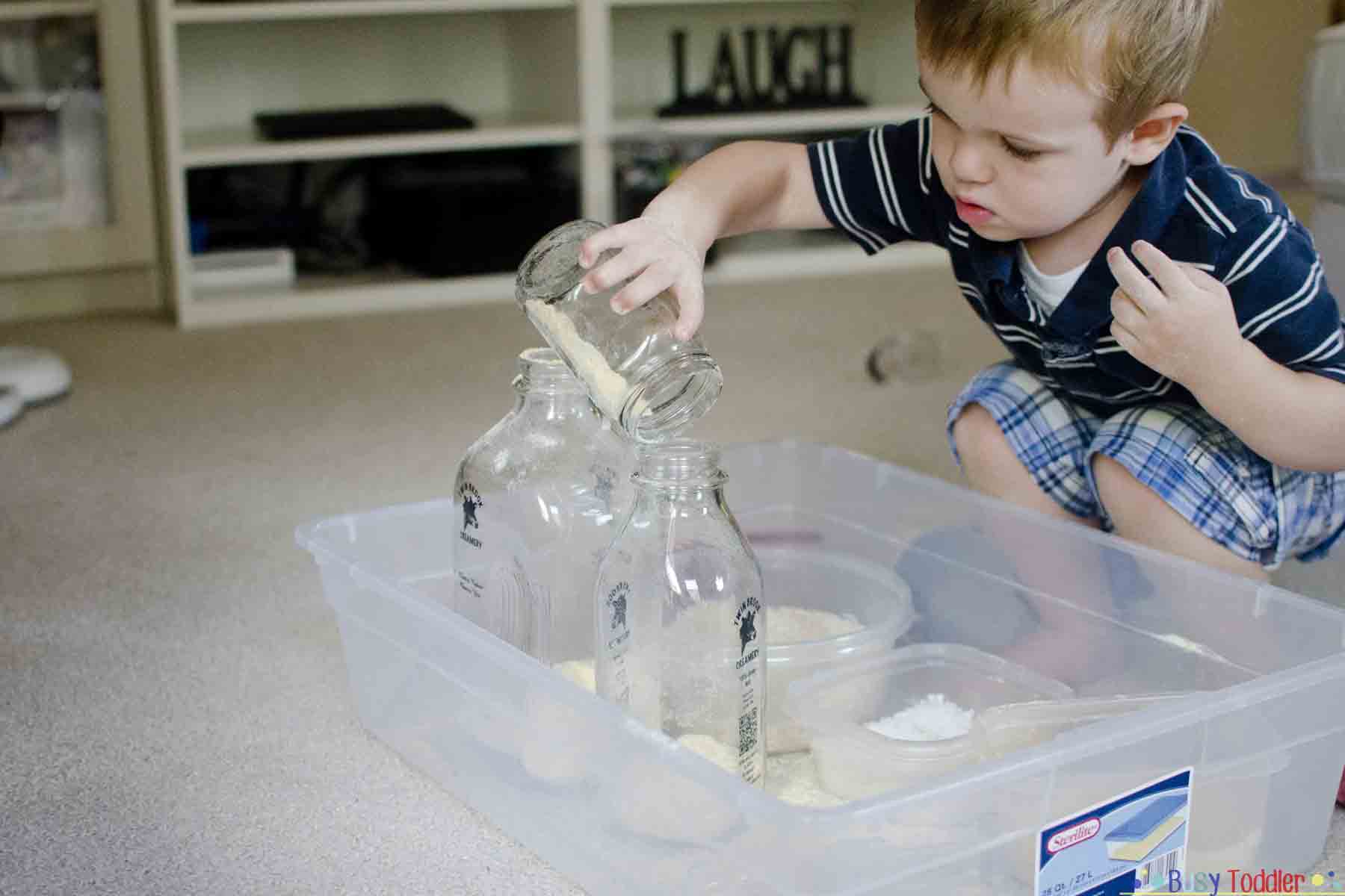 Scooping Station: A Sensory Pouring Activity - Busy Toddler