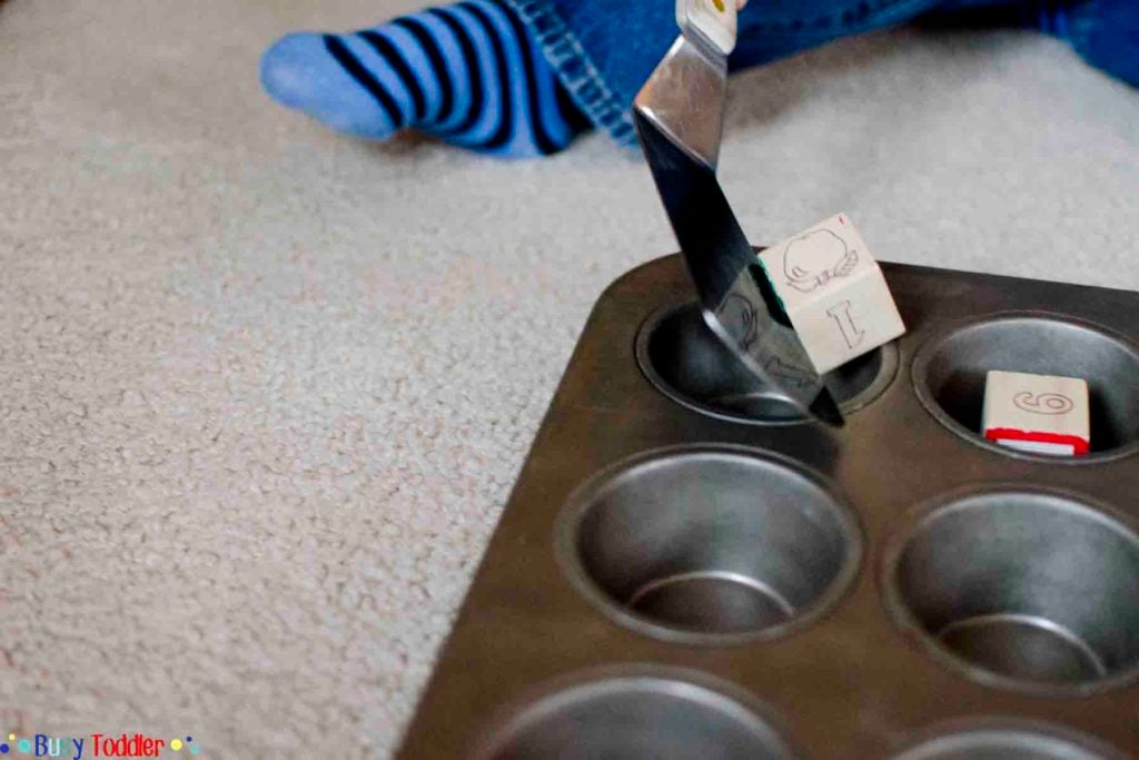 Block Carry: A Simple Indoor Activity - Busy Toddler