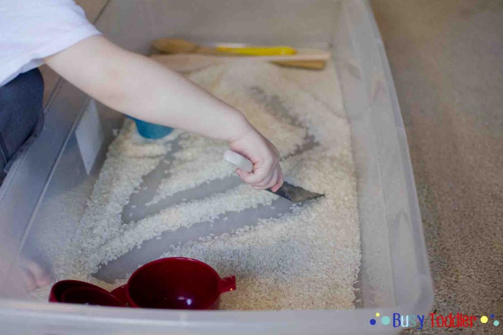 Rice Bin Sensory Play Activity - Busy Toddler