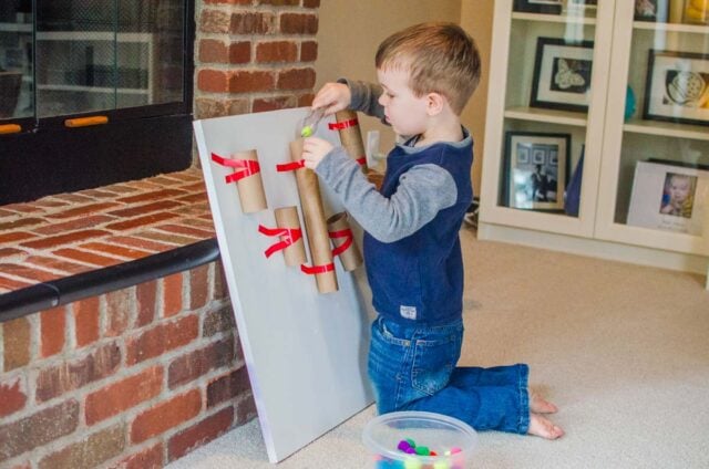 Simple Pom Pom Drop Activity - Busy Toddler