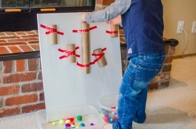 Simple Pom Pom Drop Activity - Busy Toddler