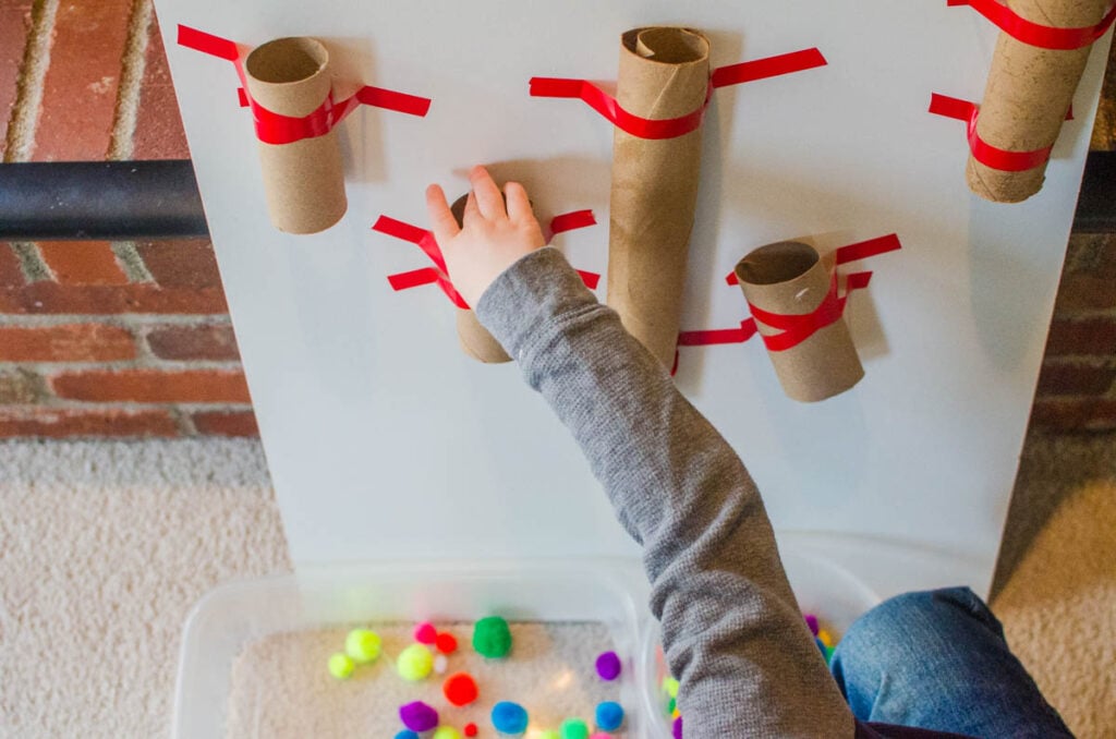 Simple Pom Pom Drop Activity - Busy Toddler