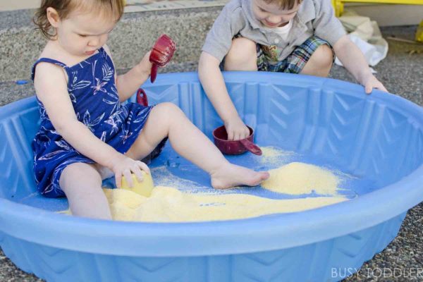 Corn Meal Sensory Pool - Busy Toddler