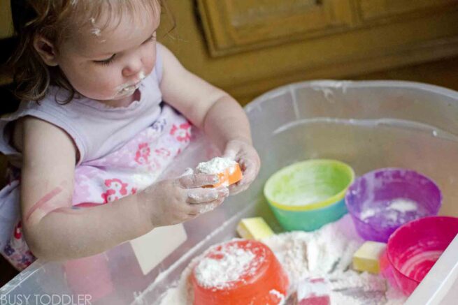 Flour Bin: an easy toddler activity - Busy Toddler