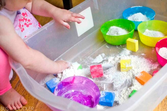 Flour Bin: an easy toddler activity - Busy Toddler