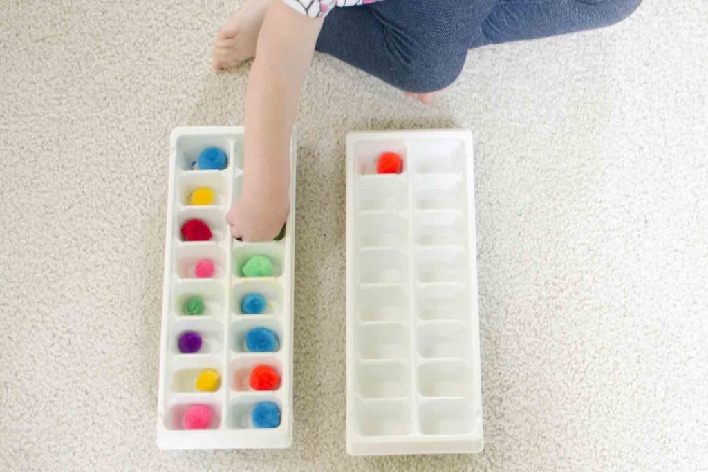 Pom Pom Grasp: Early Learning Activity - Busy Toddler