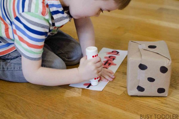 Roll & Cross Math Game - Busy Toddler