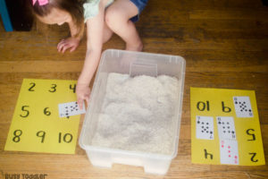 Number Hunt Math Sensory Bin - Busy Toddler