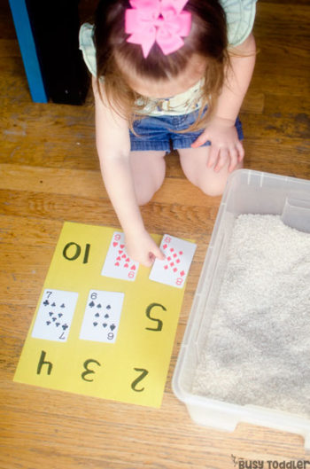 Number Hunt Math Sensory Bin - Busy Toddler