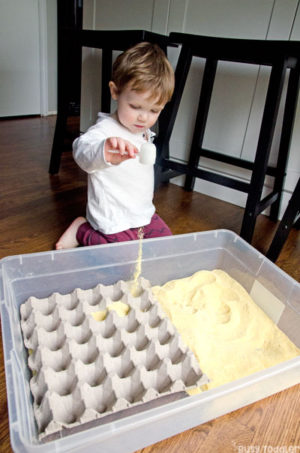 Make a Cornmeal Scooping Station - Busy Toddler