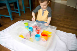 Pouring Skills: Make an Indoor Pouring Station - Busy Toddler