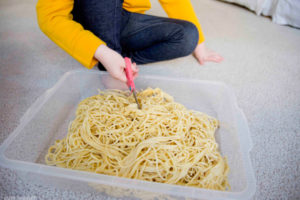 Spaghetti Cutting Bin - Scissor Skills Activity - Busy Toddler