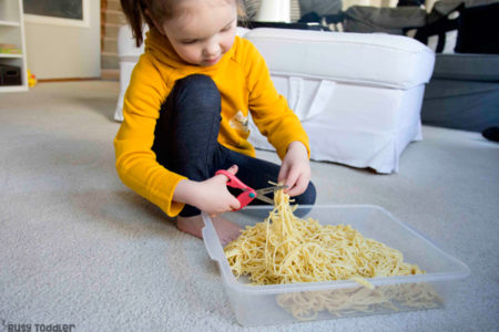 Spaghetti Cutting Bin - Scissor Skills Activity - Busy Toddler