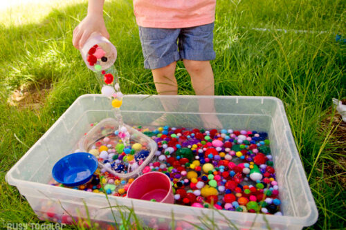 Pom Pom Water Play Outdoor Sensory Bin - Busy Toddler