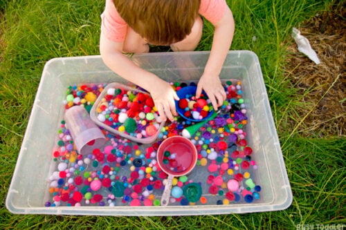 Pom Pom Water Play Outdoor Sensory Bin - Busy Toddler