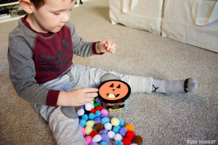 Feed the Pumpkin Halloween Toddler Activity - Busy Toddler