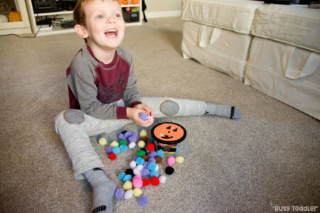 Feed the Pumpkin Halloween Toddler Activity - Busy Toddler