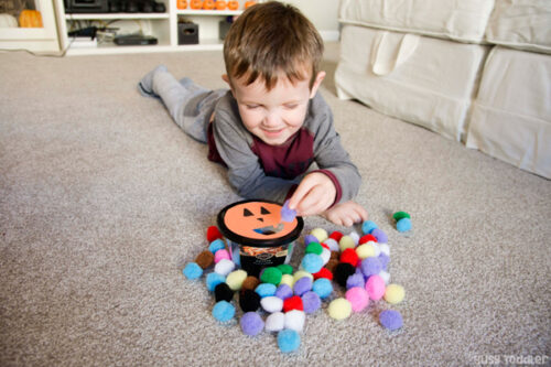 Feed the Pumpkin Halloween Toddler Activity - Busy Toddler
