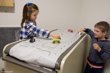 Use a Doctor's Office Road to entertain kids will waiting - Busy Toddler