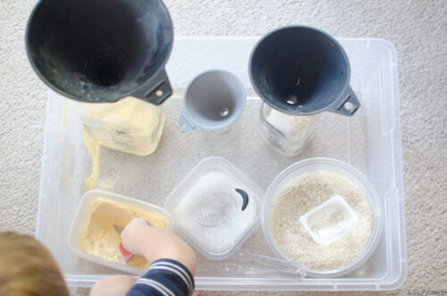 Scooping Station: A Sensory Pouring Activity - Busy Toddler