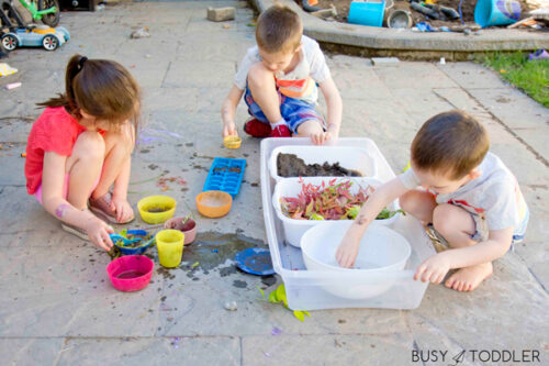 DIY Mud Kitchen: an outdoor sensory activity - Busy Toddler