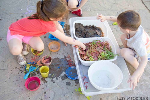 DIY Mud Kitchen: an outdoor sensory activity - Busy Toddler