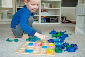 Puzzle Unwrap: A Fun Toddler Activity - Busy Toddler