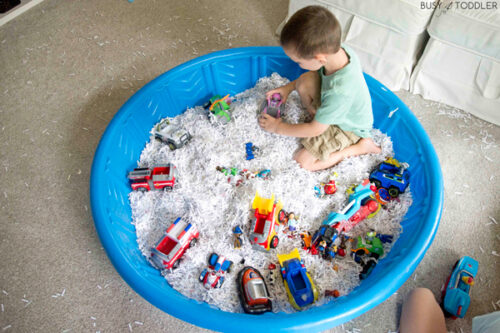 Shredded Paper Sensory Bin Activity - Busy Toddler