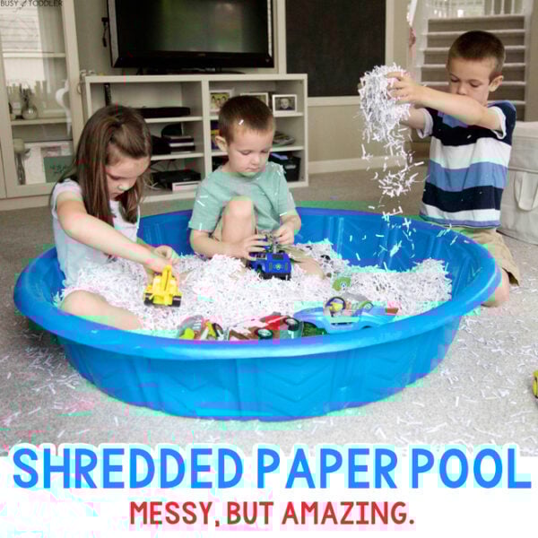 Shredded Paper Sensory Bin Activity - Busy Toddler