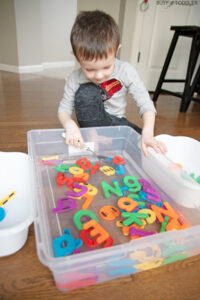 Alphabet Scoop and Transfer Literacy Activity - Busy Toddler