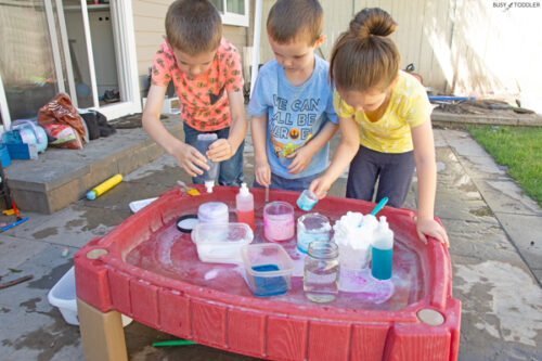 Outdoor Potions: A Science Sensory Activity - Busy Toddler