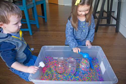 How to Use Rainbow Rice with Toddlers - Busy Toddler