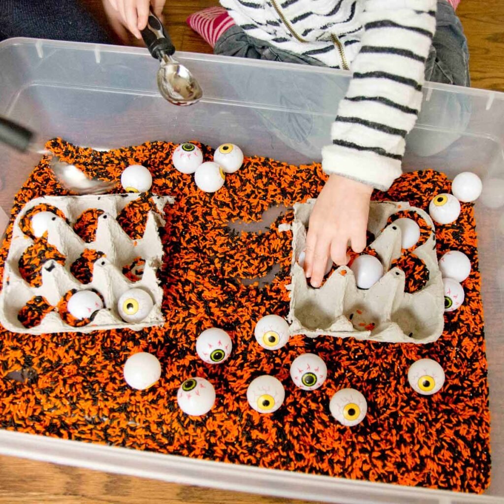 Halloween Sensory with Dyed Rice - Busy Toddler