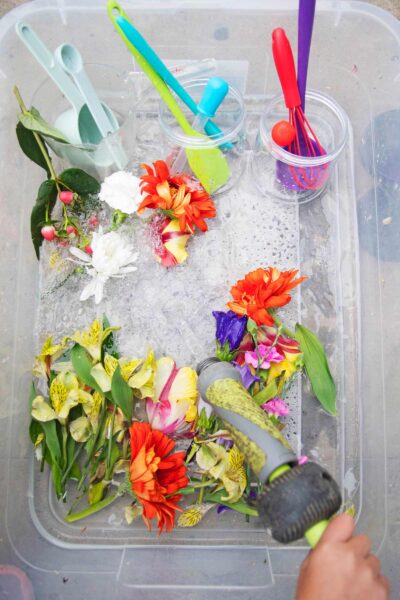 Flower Soup Outdoor Sensory Bin - Busy Toddler
