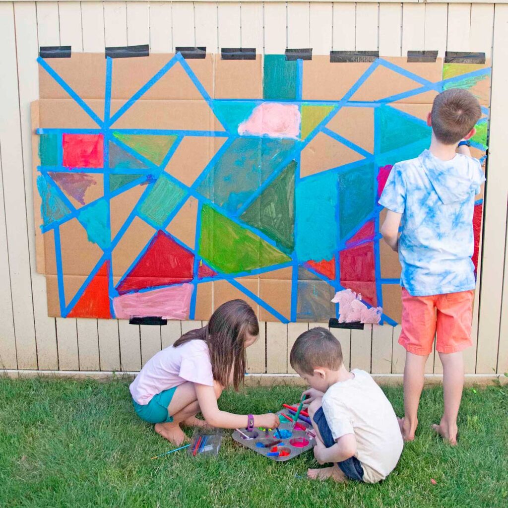 Giant Tape Resist Art Outdoor Activity - Busy Toddler