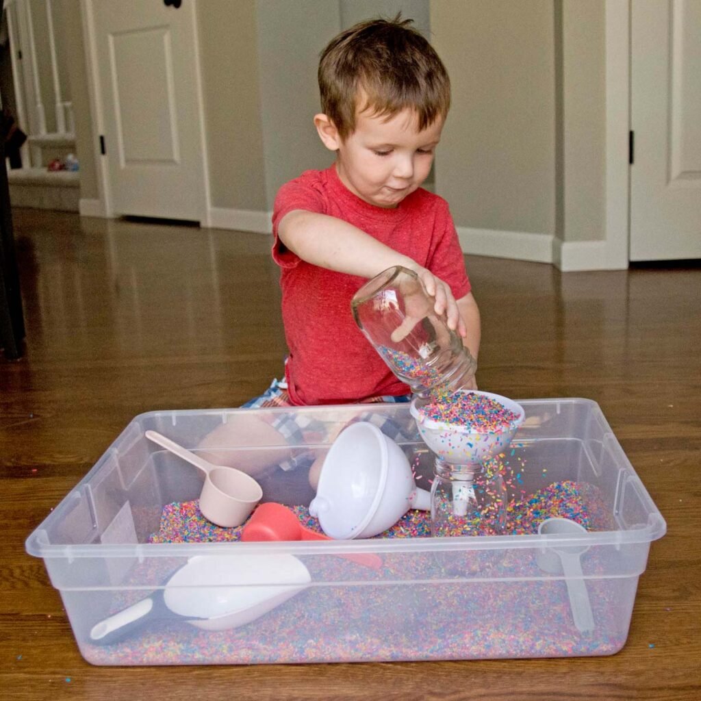 Rainbow Rice Sensory Bin - Busy Toddler