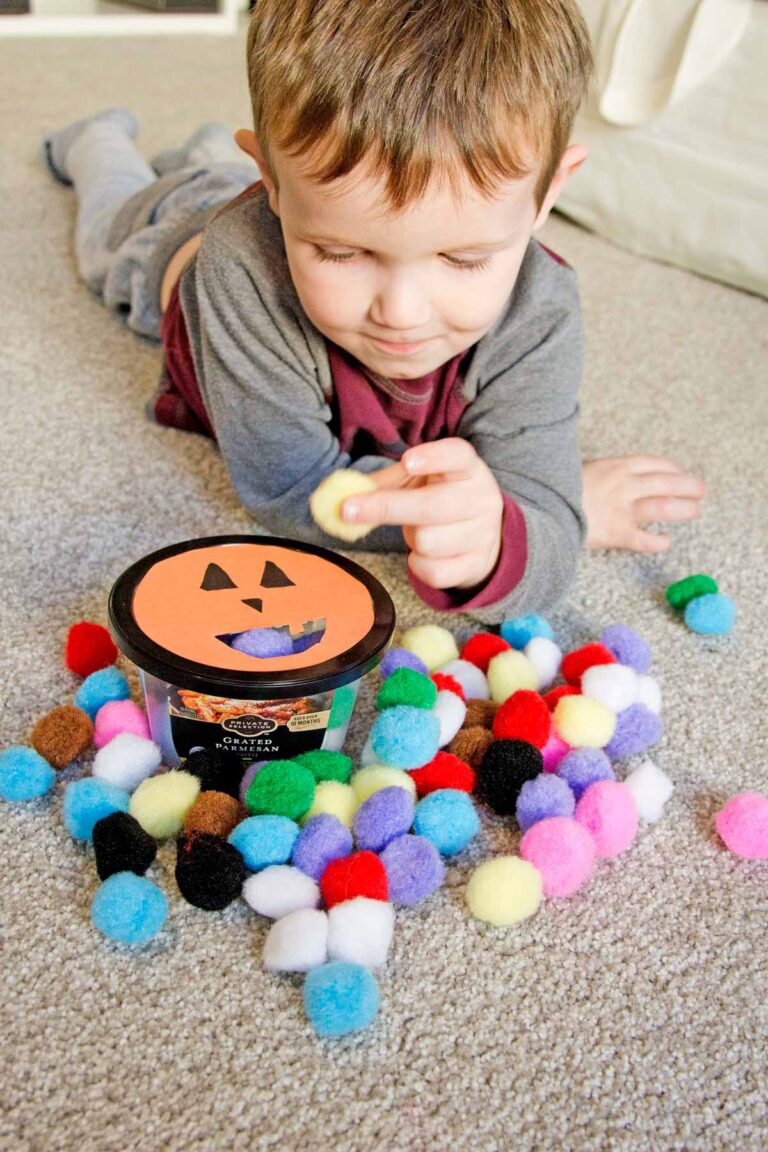 Feed the Pumpkin Halloween Toddler Activity - Busy Toddler
