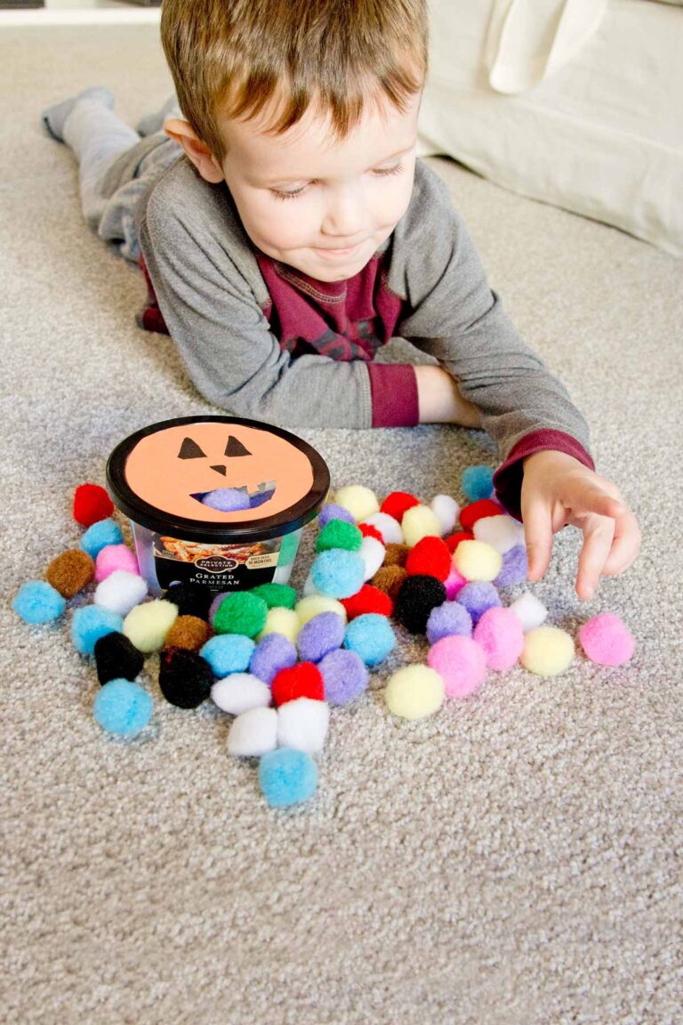 Feed the Pumpkin Halloween Toddler Activity - Busy Toddler