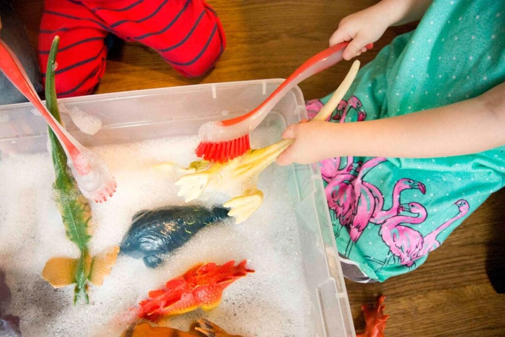 Dinosaur Bath Sensory Activity - Busy Toddler