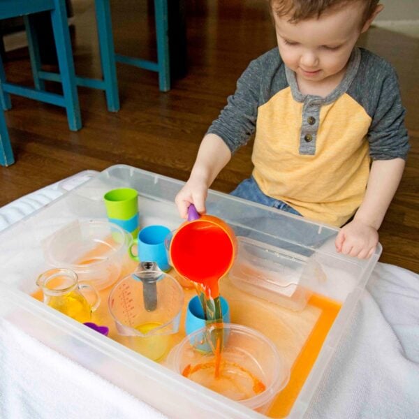 Pouring Skills: Make an Indoor Pouring Station - Busy Toddler