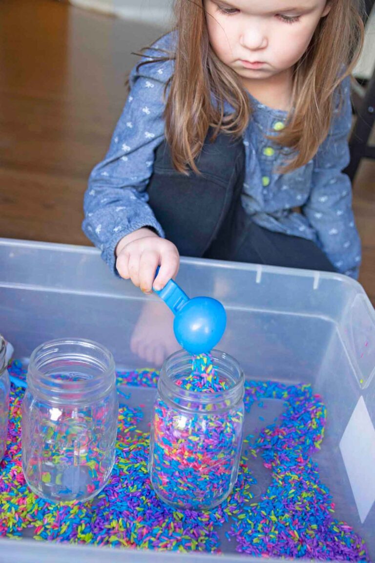 How to Use Rainbow Rice with Toddlers - Busy Toddler