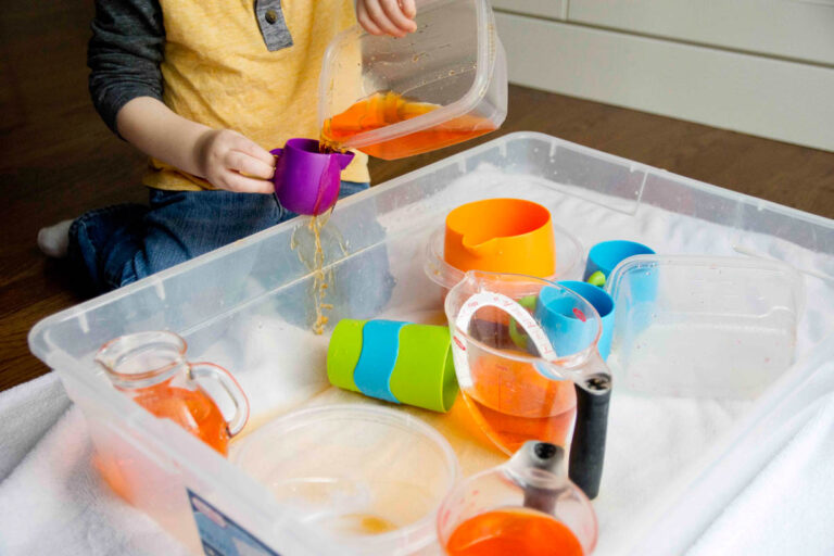 Pouring Skills: Make an Indoor Pouring Station - Busy Toddler