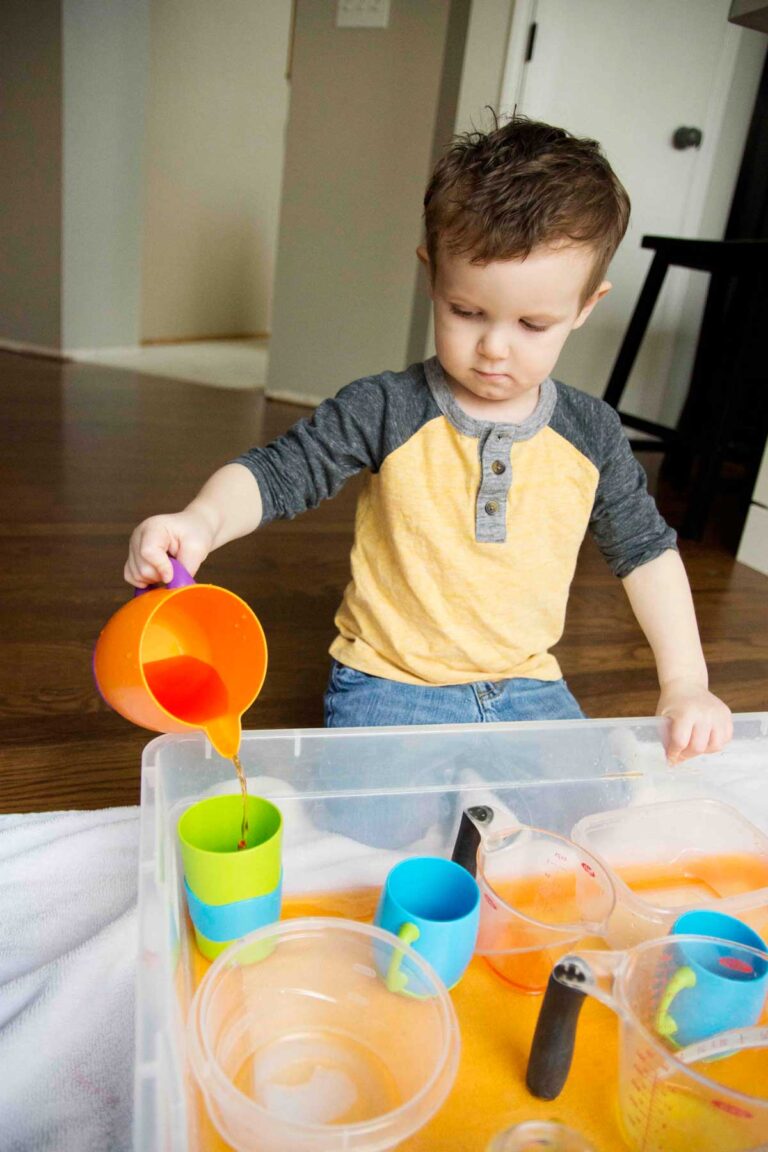 Pouring Skills: Make an Indoor Pouring Station - Busy Toddler