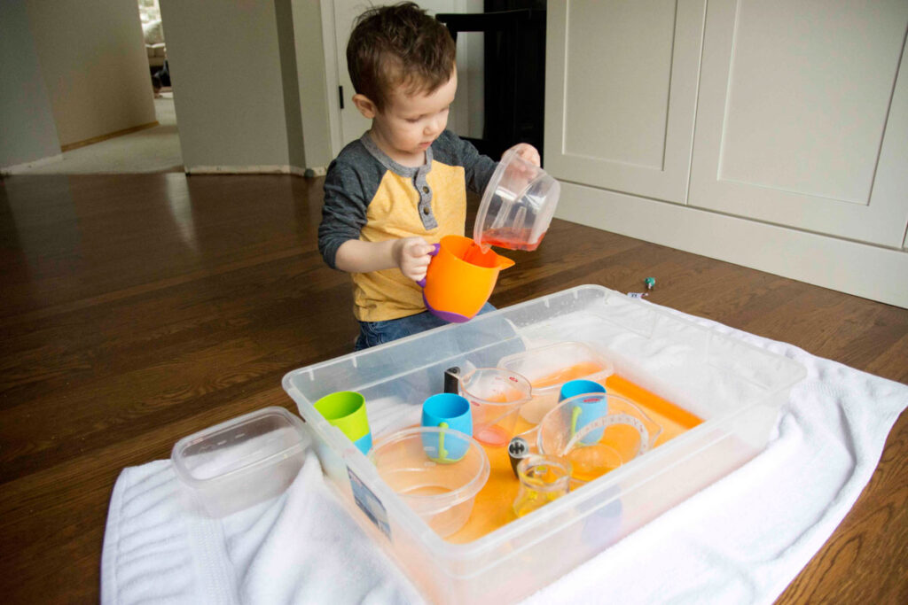 Pouring Skills: Make an Indoor Pouring Station - Busy Toddler