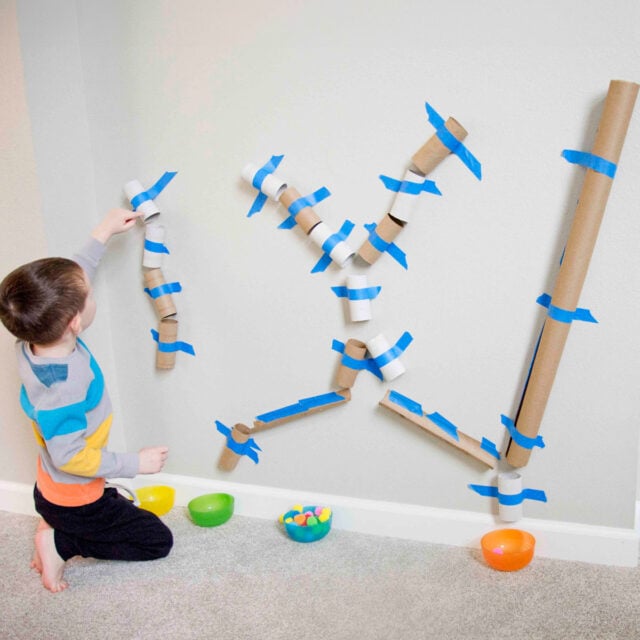 Pom Pom Tube Ramp Easy Activity - Busy Toddler