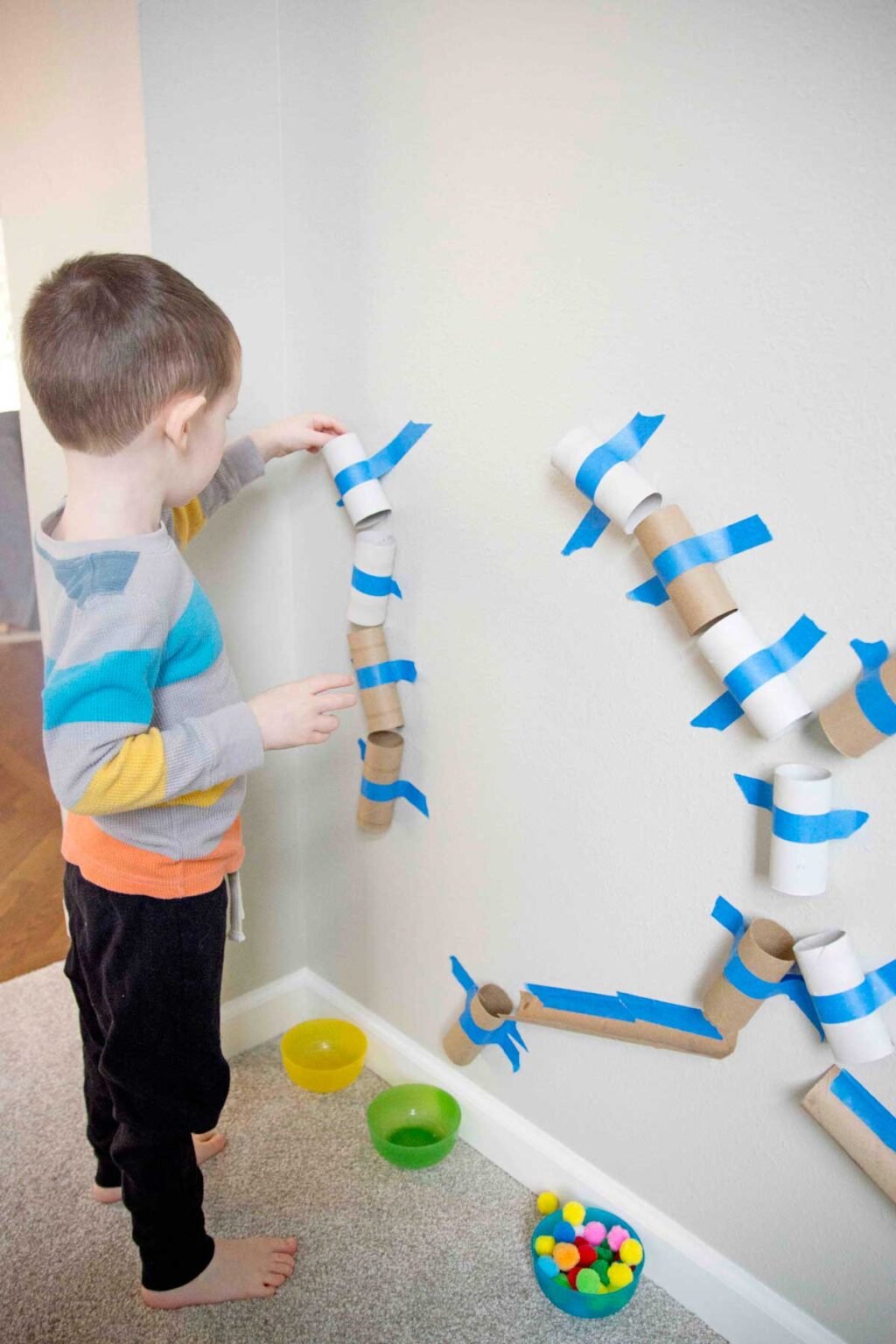Pom Pom Tube Ramp Easy Activity - Busy Toddler