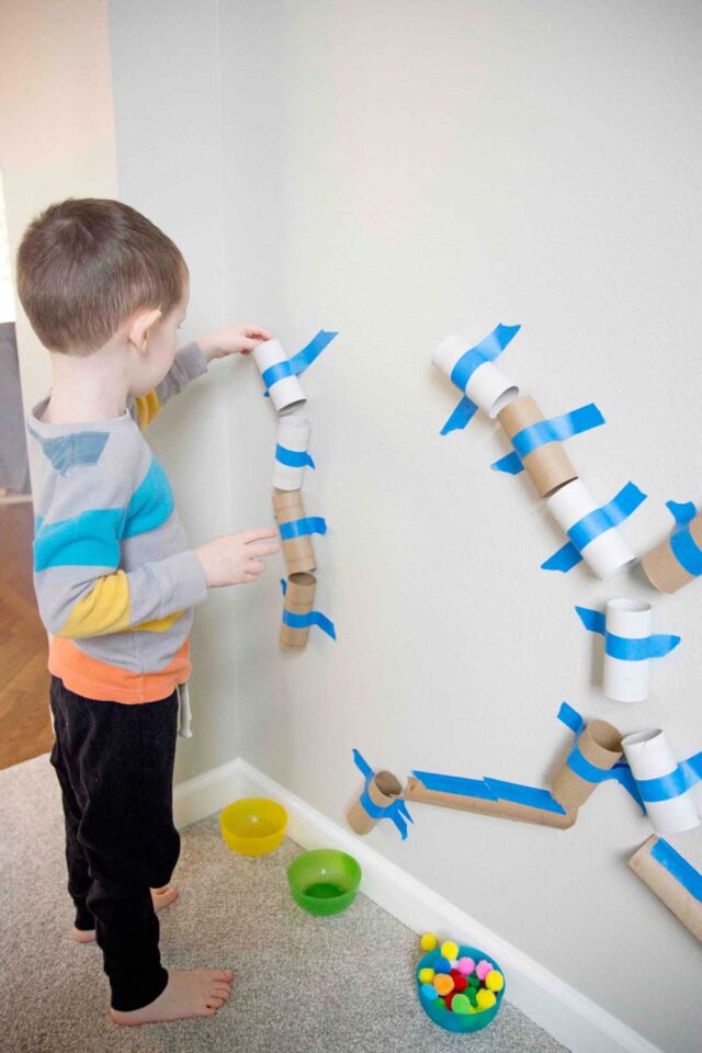Pom Pom Tube Ramp Easy Activity - Busy Toddler