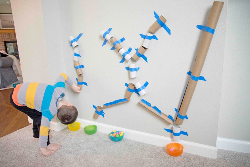 Pom Pom Tube Ramp Easy Activity - Busy Toddler