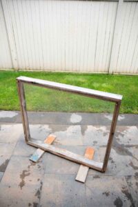 How to Make an Outdoor Easel - Busy Toddler